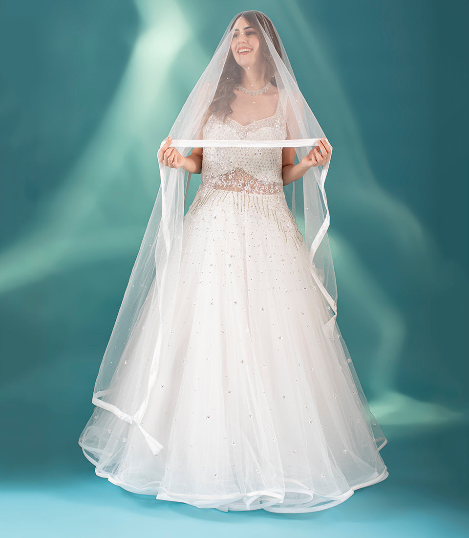 Designer wedding lehengas, indo western gowns, party wear sarees – Roopkala